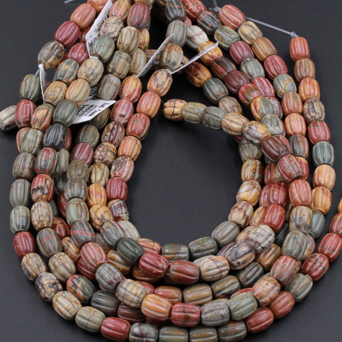 Red Creek Jasper Beads Hand Carved Melon Drum Tube Earthy Red Green Ye – Intrinsic Trading