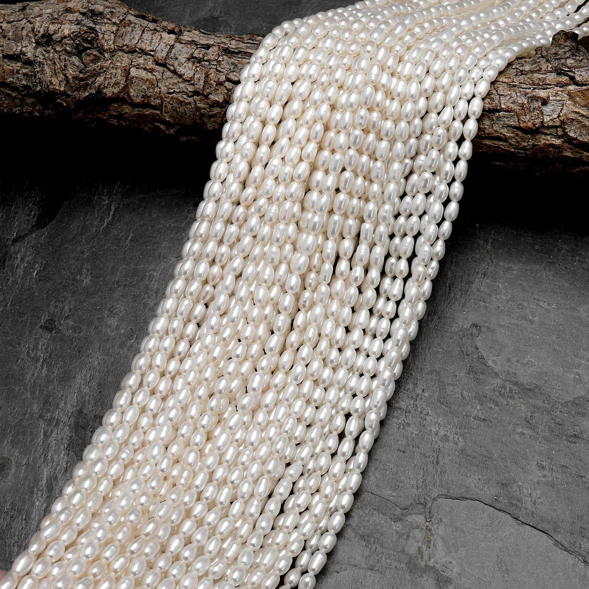 AAA Genuine Freshwater White Pearl Oval Rice Shape 5x3mm Iridescent Hi ...