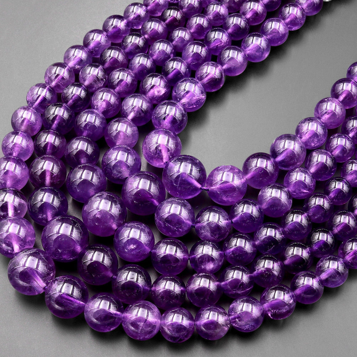 AAA Graduated Natural Purple Amethyst Smooth Round Beads 20" Long Fini ...